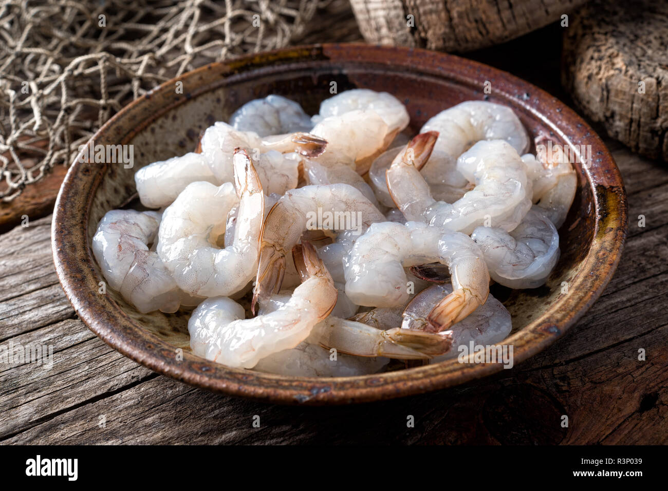 A bowl of fresh raw pacific white shrimp peeled with tail on Stock ...