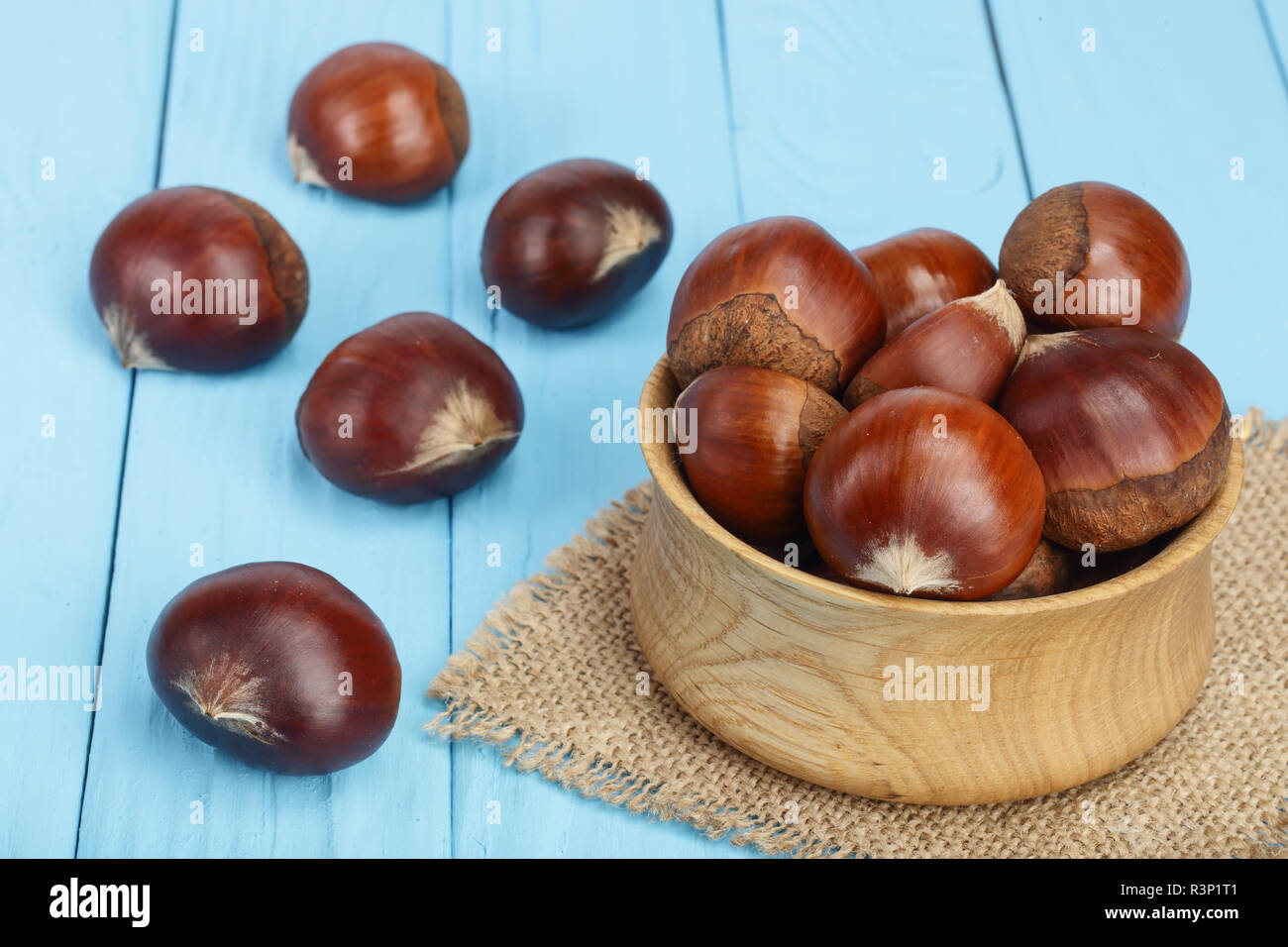 Chestnut in wooden bowl hi-res stock photography and images - Alamy