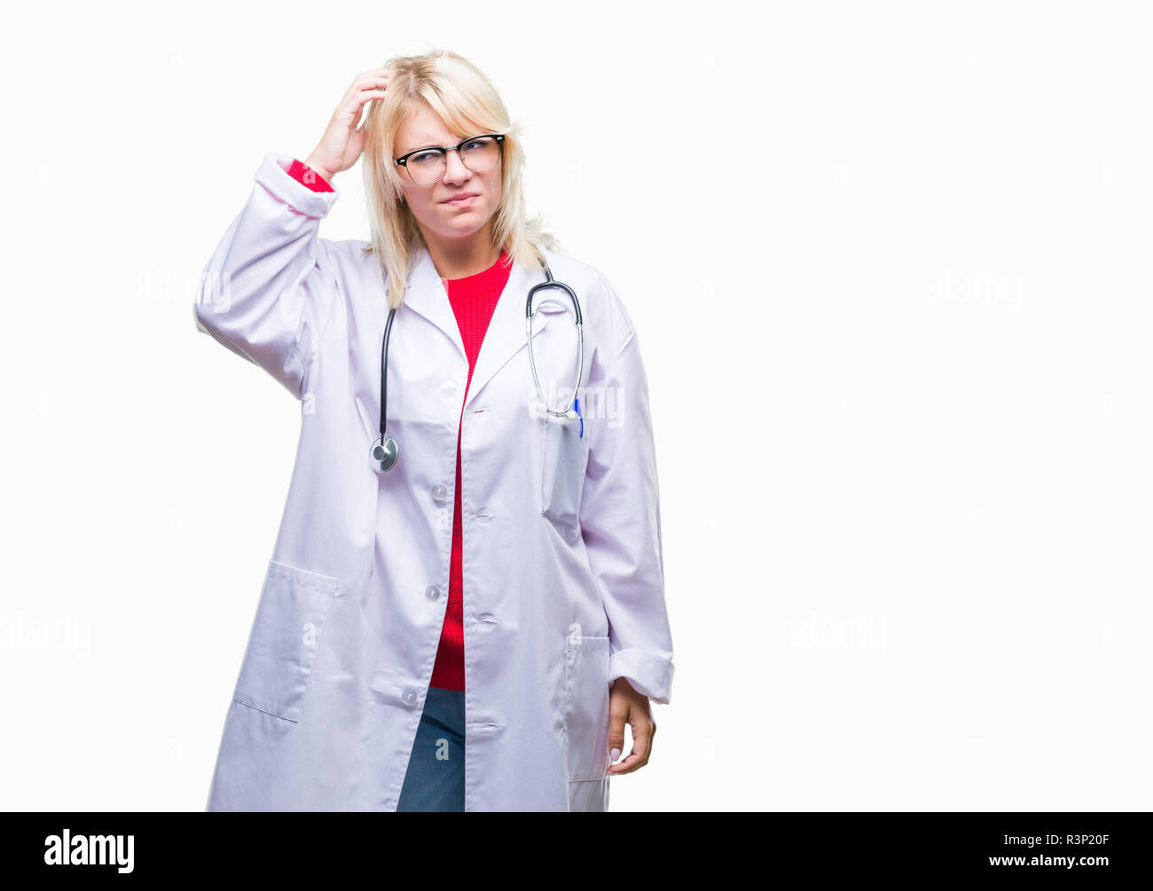 Young beautiful blonde doctor woman wearing medical uniform over ...