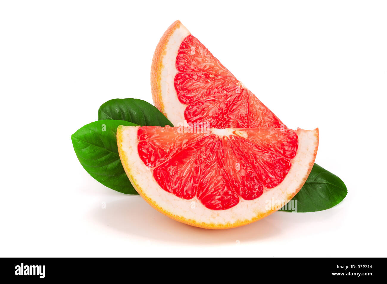 Two sliced fresh grapefruits green hi-res stock photography and images ...