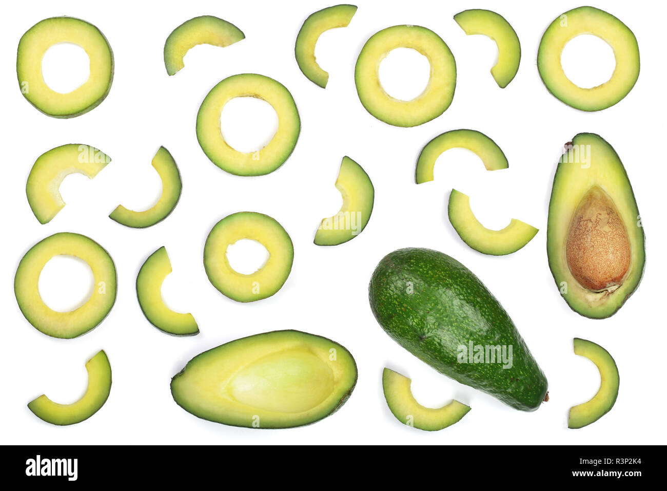 avocado slices isolated on white background. Top view. Flat lay pattern ...