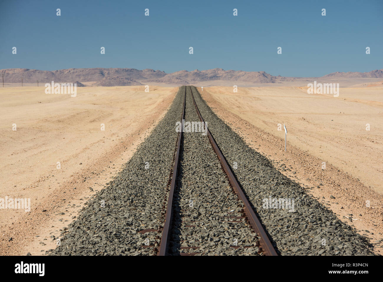 Railway track in the desert Stock Photo - Alamy