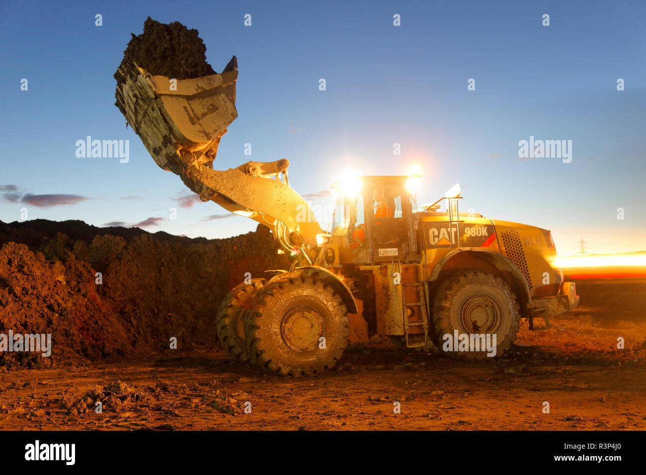 Cat 980h Loader Loading Coal Truck