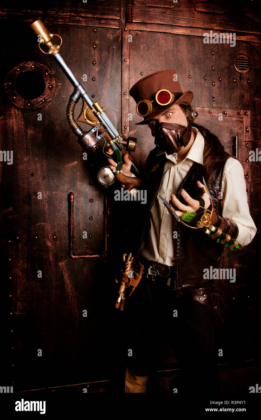 Steampunk man armed with a rifle Stock Photo - Alamy