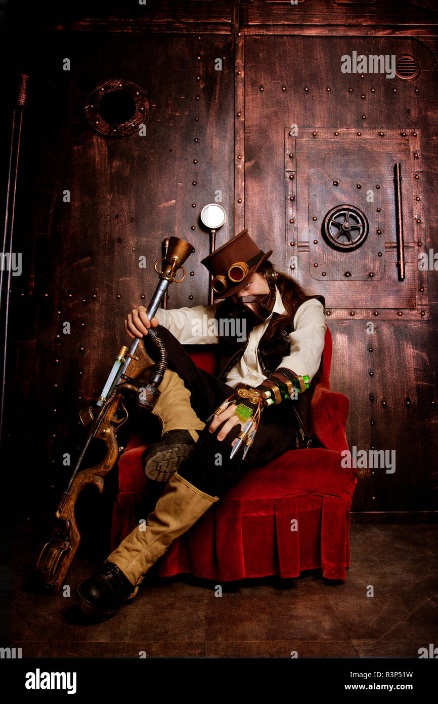 Steampunk man armed with a rifle Stock Photo - Alamy