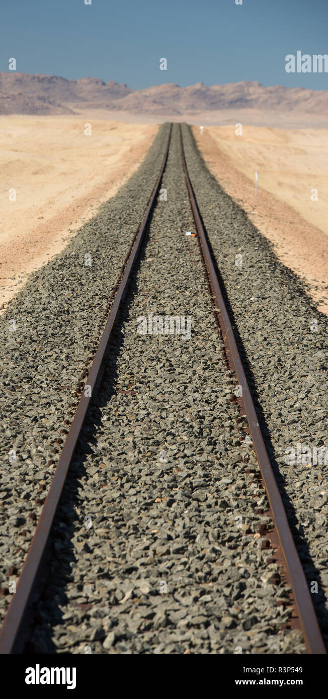Railway track in the desert Stock Photo - Alamy