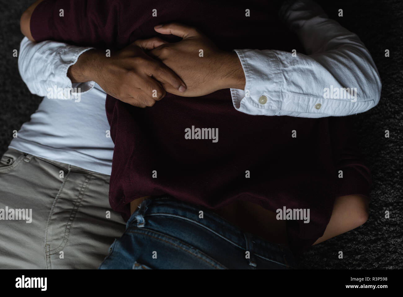 Woman asleep on floor hi-res stock photography and images - Alamy