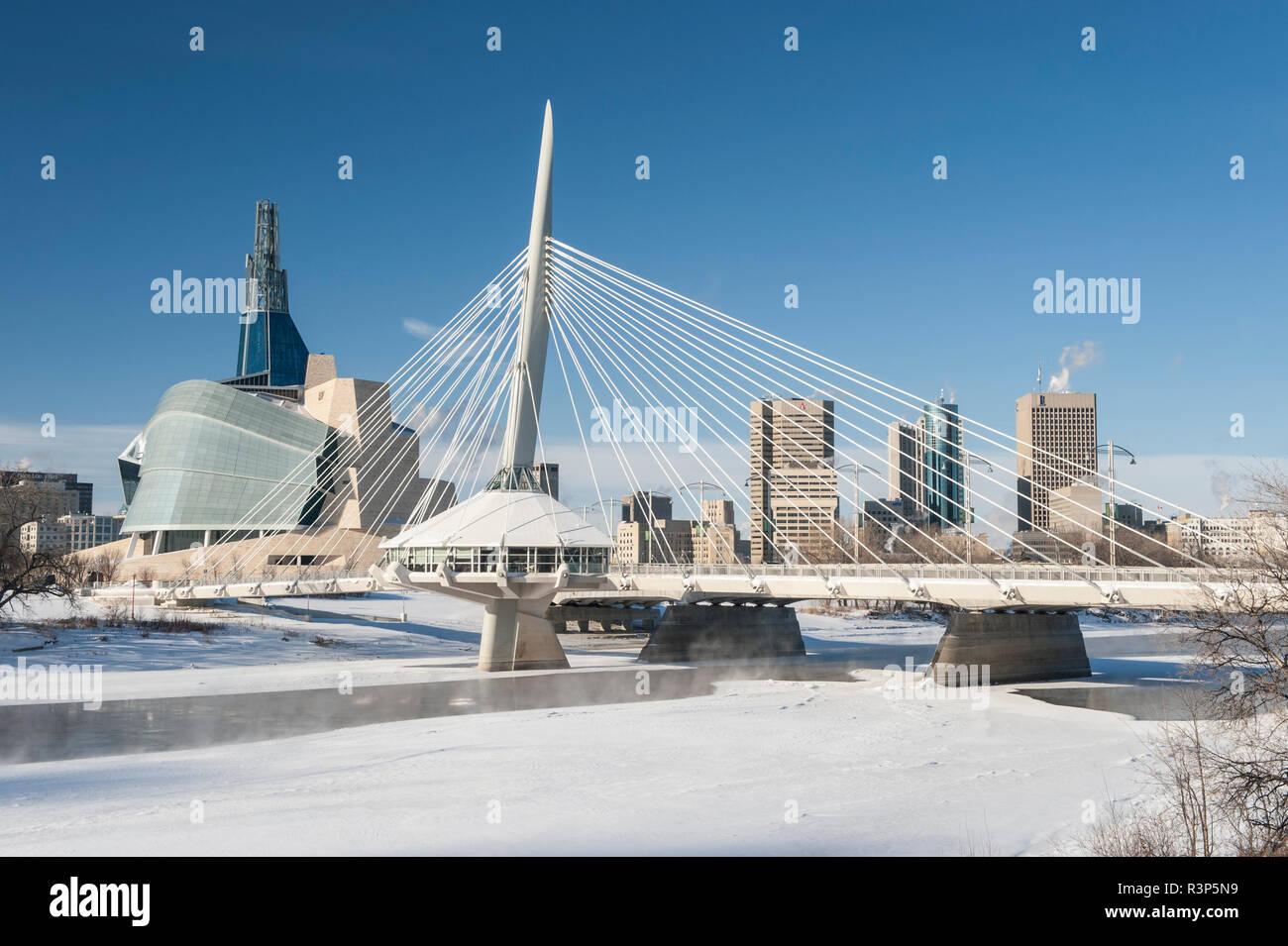 Canada, Manitoba, Winnipeg. Winter skyline with museum and Esplanade ...