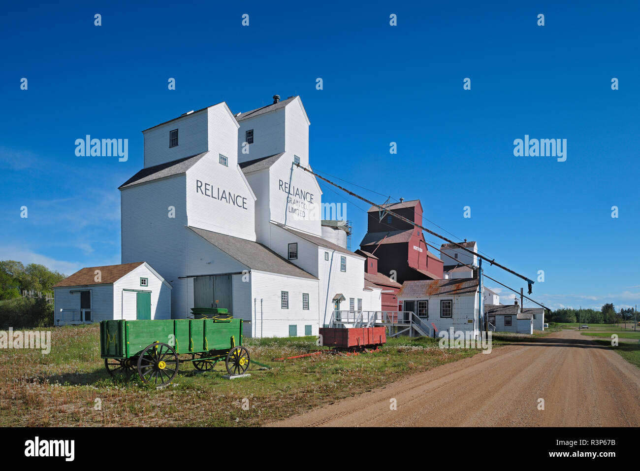 Canada, Manitoba, Inglis. Grain elevators and road Stock Photo - Alamy
