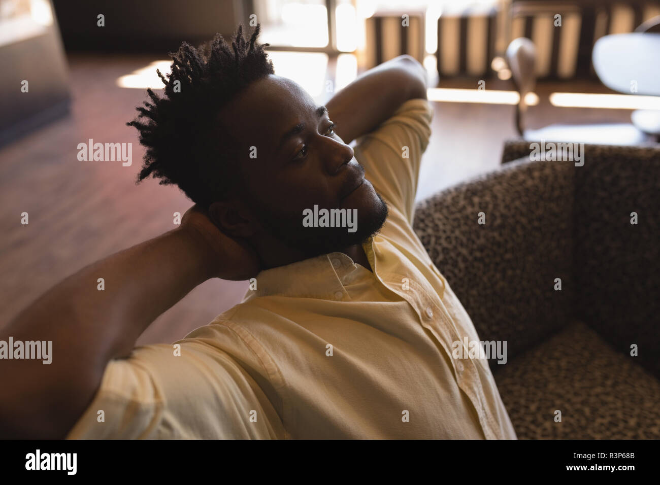 Hands behind head hi-res stock photography and images - Alamy