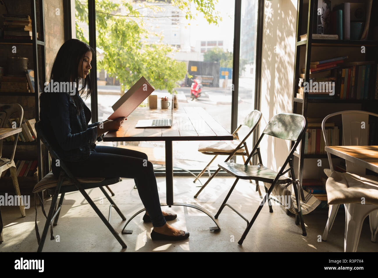 Menu woman holding hi-res stock photography and images - Alamy