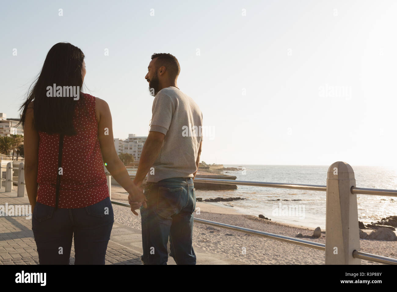 Couple standing at promenade Stock Photo - Alamy
