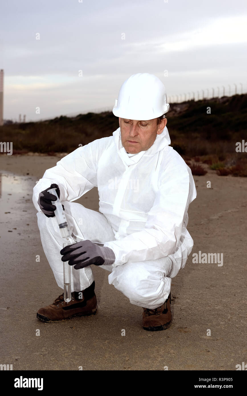 Man with testing ocean water hi-res stock photography and images - Alamy