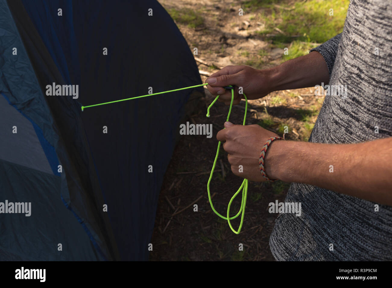 Man in a tent hi-res stock photography and images - Alamy