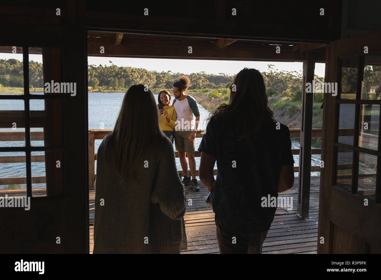 Group of friends having fun in cabin Stock Photo - Alamy