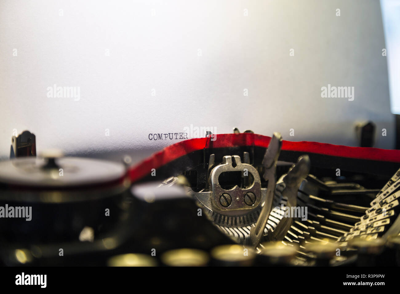 antique old travel typewriter with computer lettering on paper Stock ...