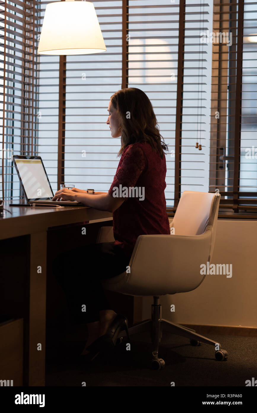 Using computer hotel room hi-res stock photography and images - Alamy