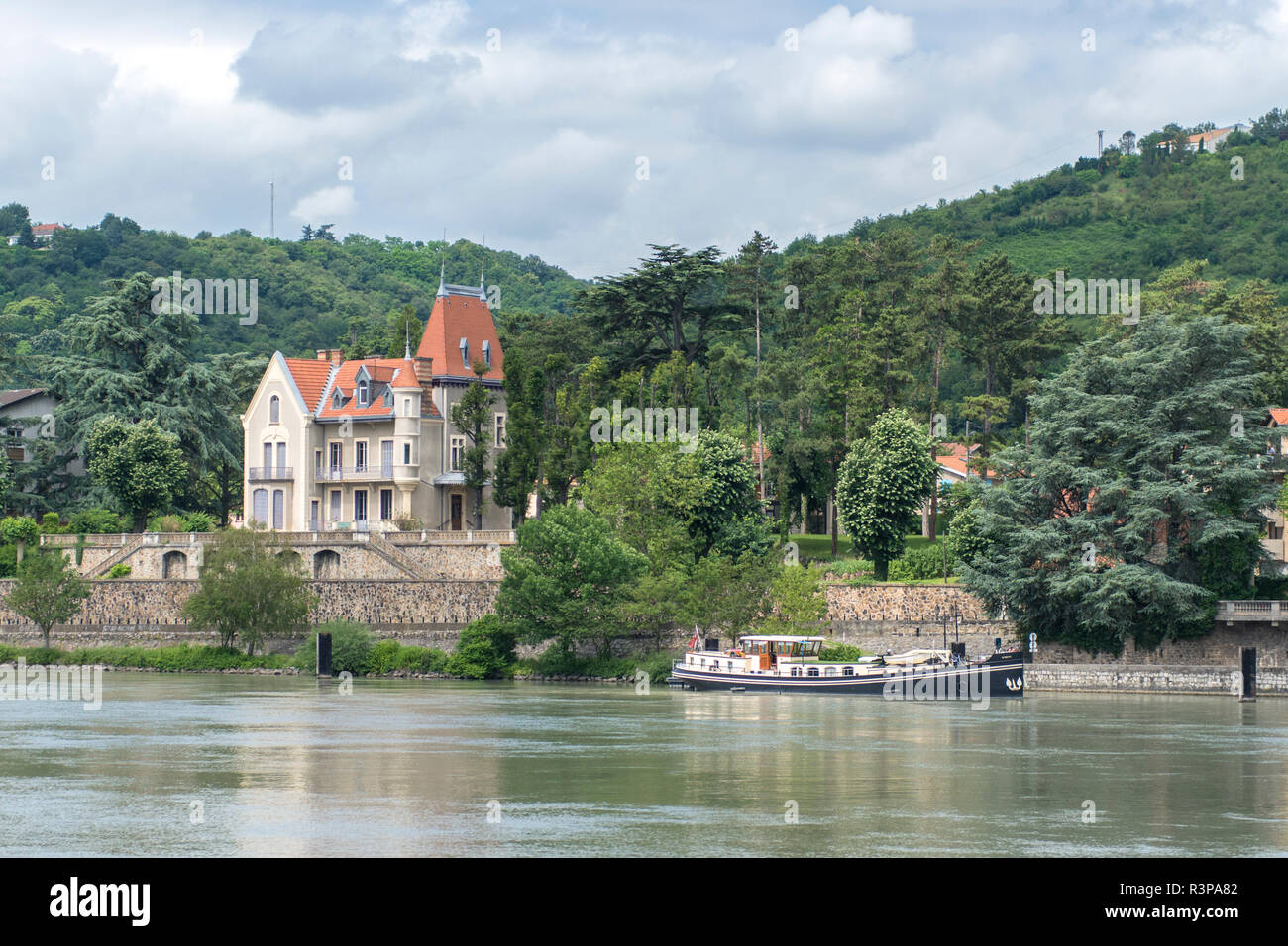 House and barge on Rhone river, Vienne, France Stock Photo - Alamy