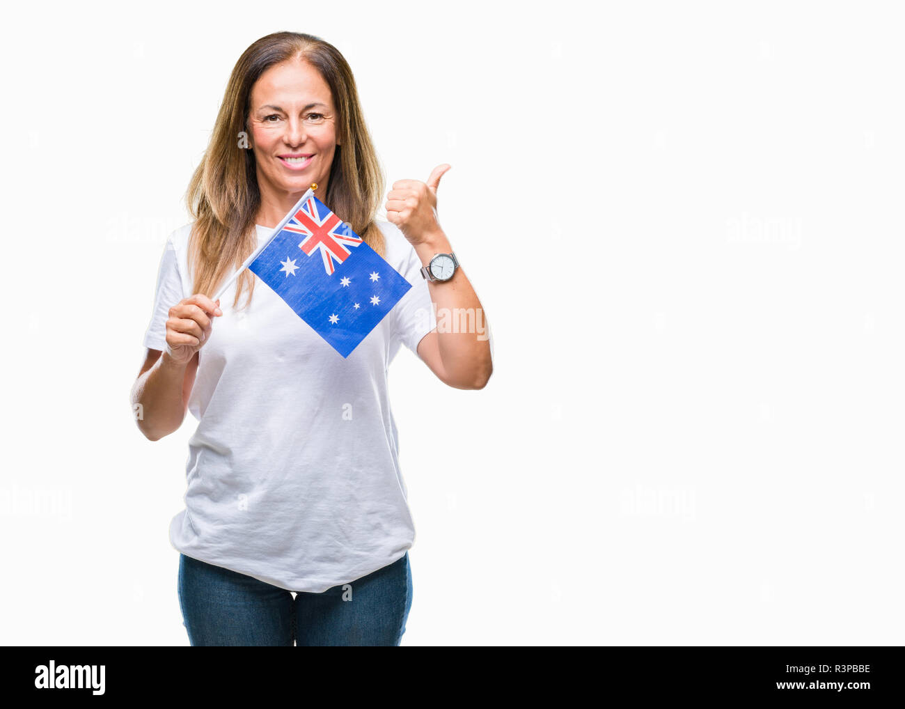Middle age hispanic woman holding flag of Australia over isolated ...