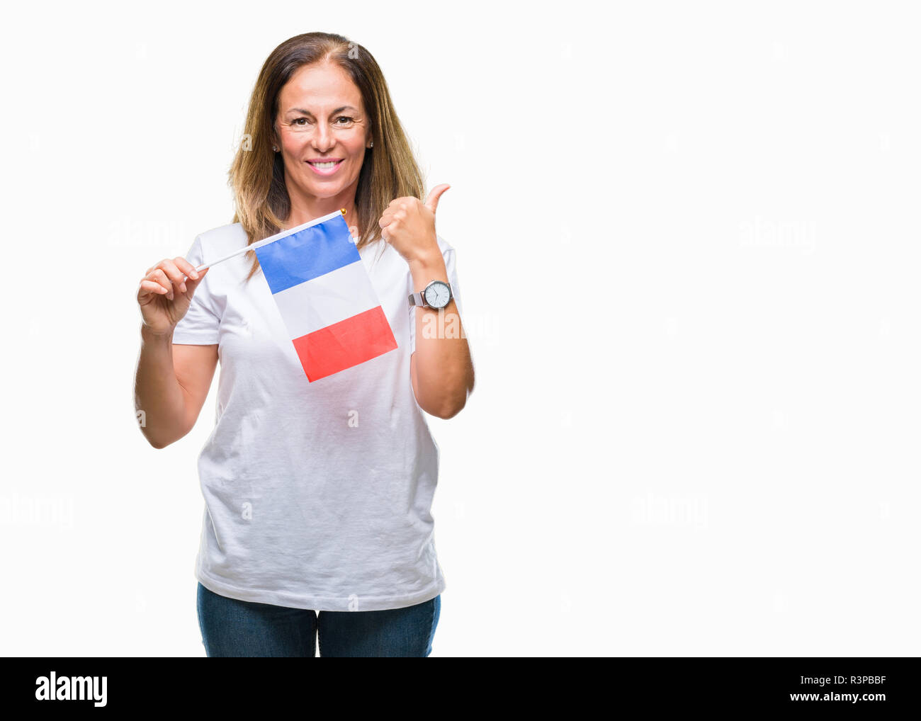 Middle age hispanic woman holding flag of France over isolated ...