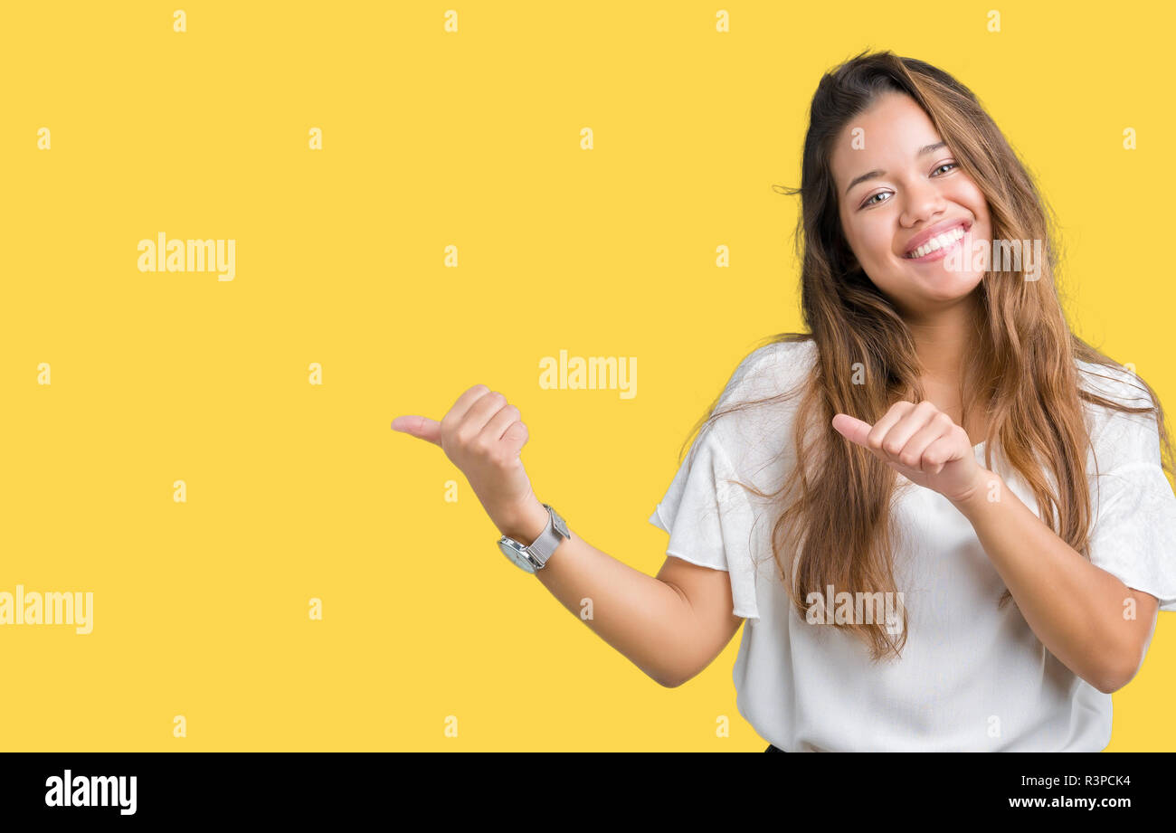 Portrait brunette woman pointing behind hi-res stock photography and ...