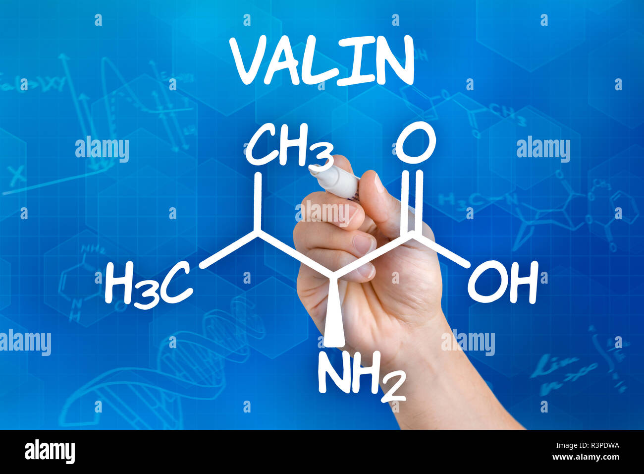 hand with pencil draws chemical structural formula of valine Stock ...