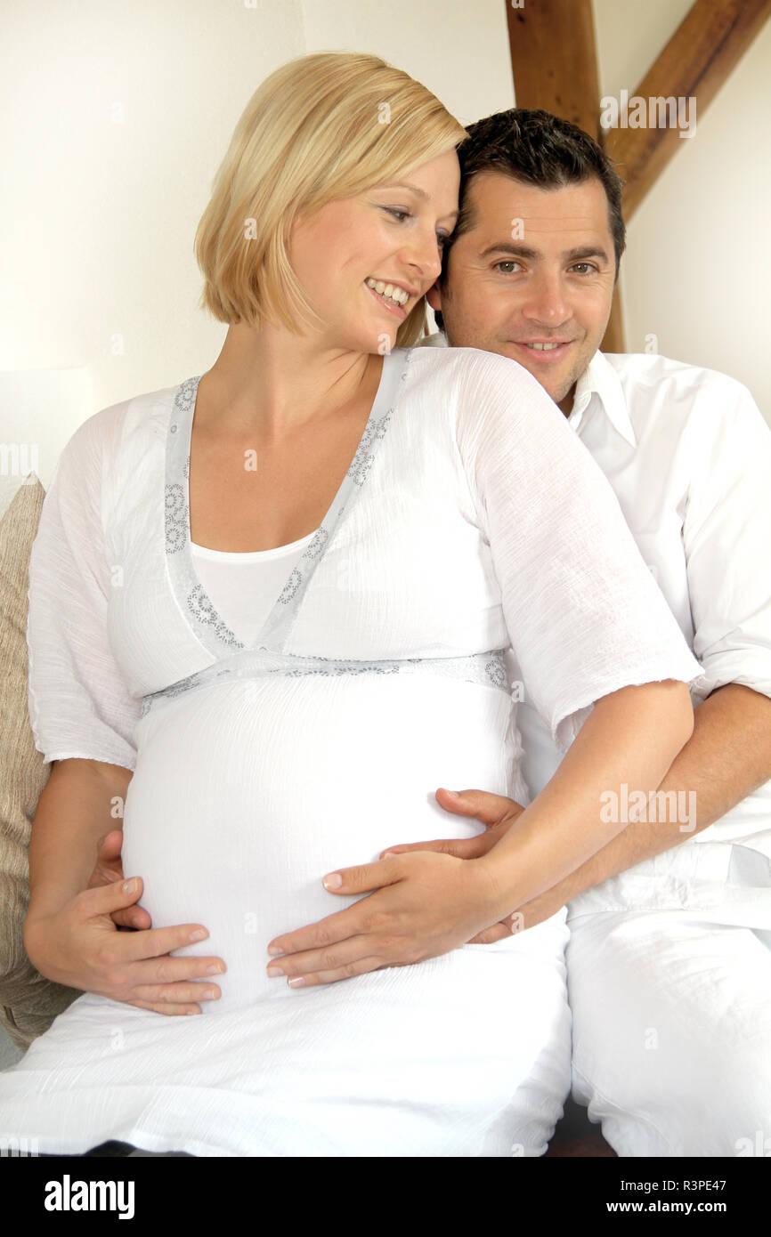 happy pregnant couple Stock Photo - Alamy