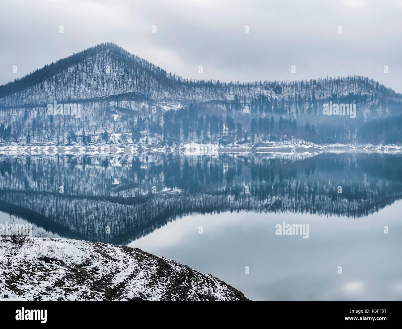 Long exposure early Winter snow in Europe Croatia Lokve lake ...