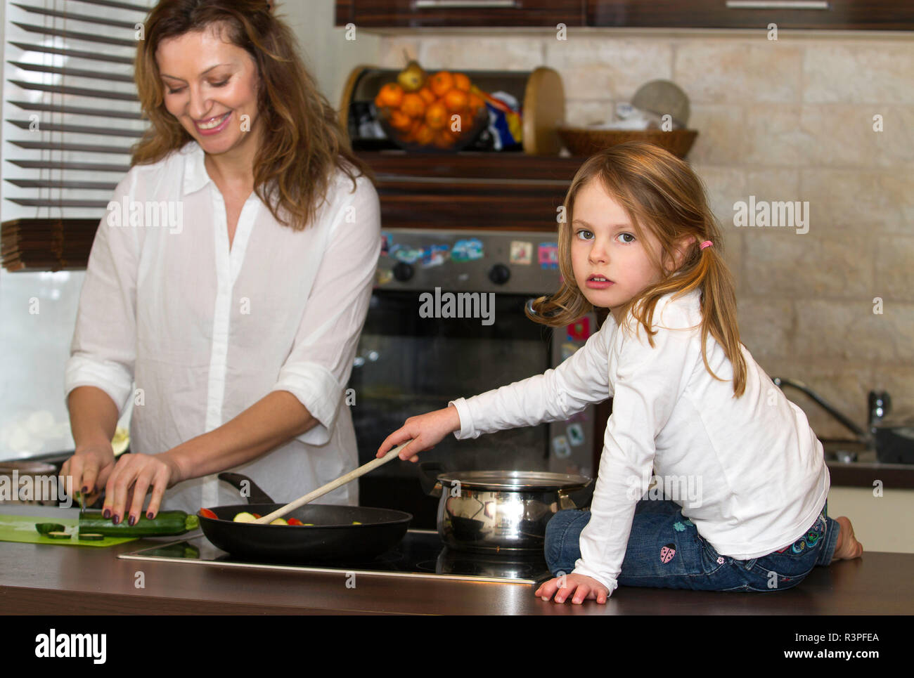 Cooks helper hi-res stock photography and images - Alamy