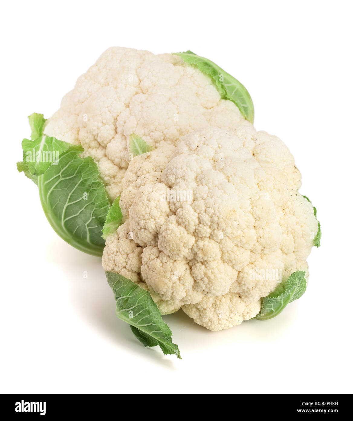 Ripe cauliflower with green leaves isolated on white background Stock ...