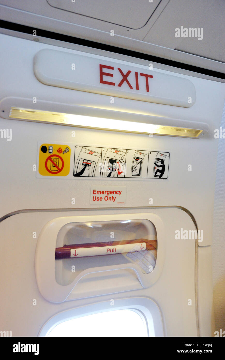 Emergency exit door plane hi-res stock photography and images - Alamy