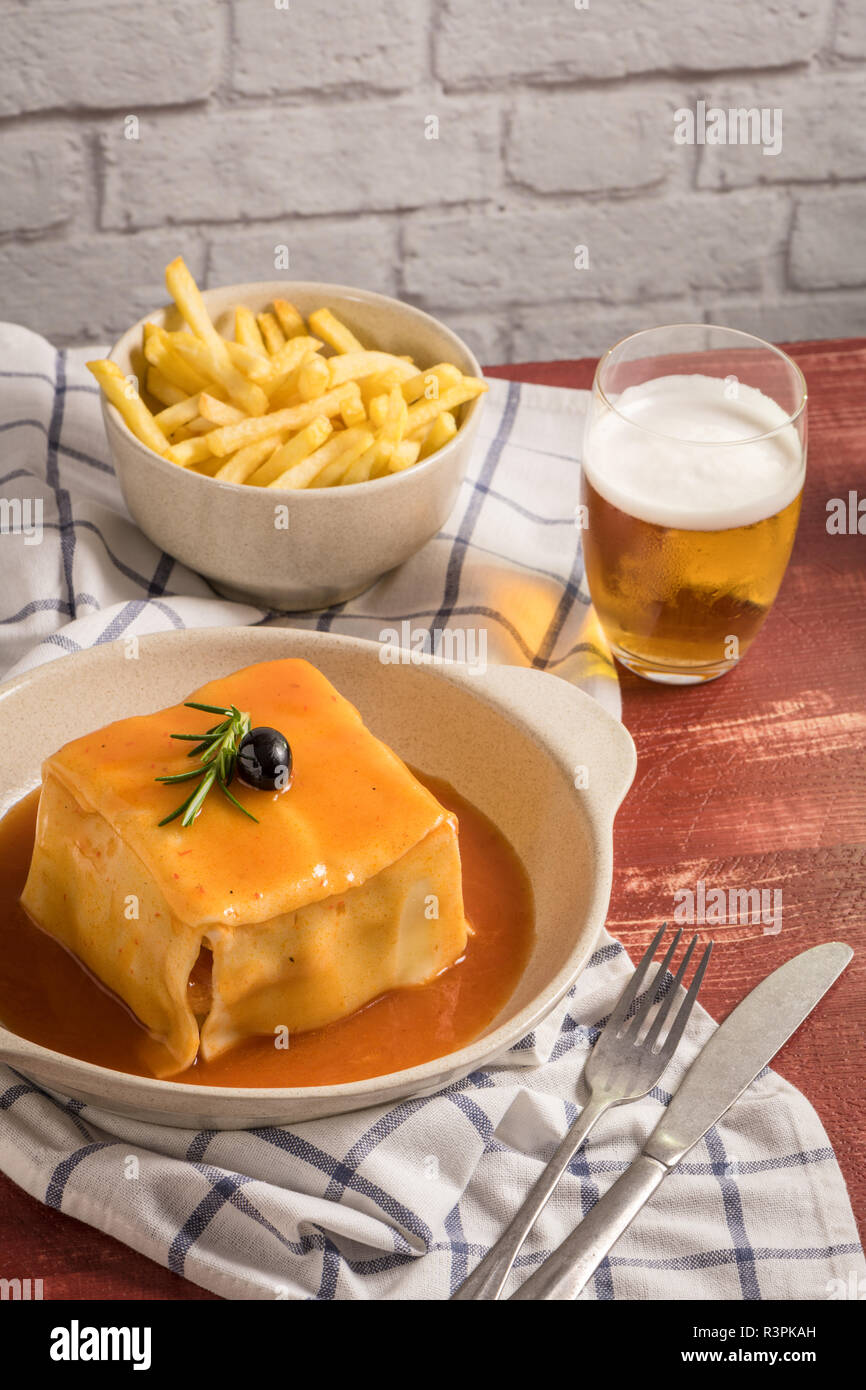 Traditional Portuguese snack food. Francesinha sandwich of bread ...