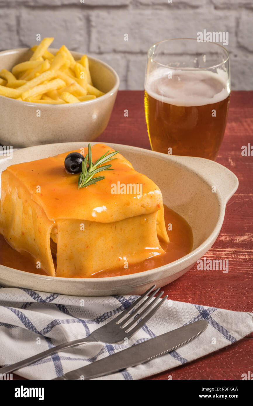 Traditional Portuguese snack food. Francesinha sandwich of bread ...