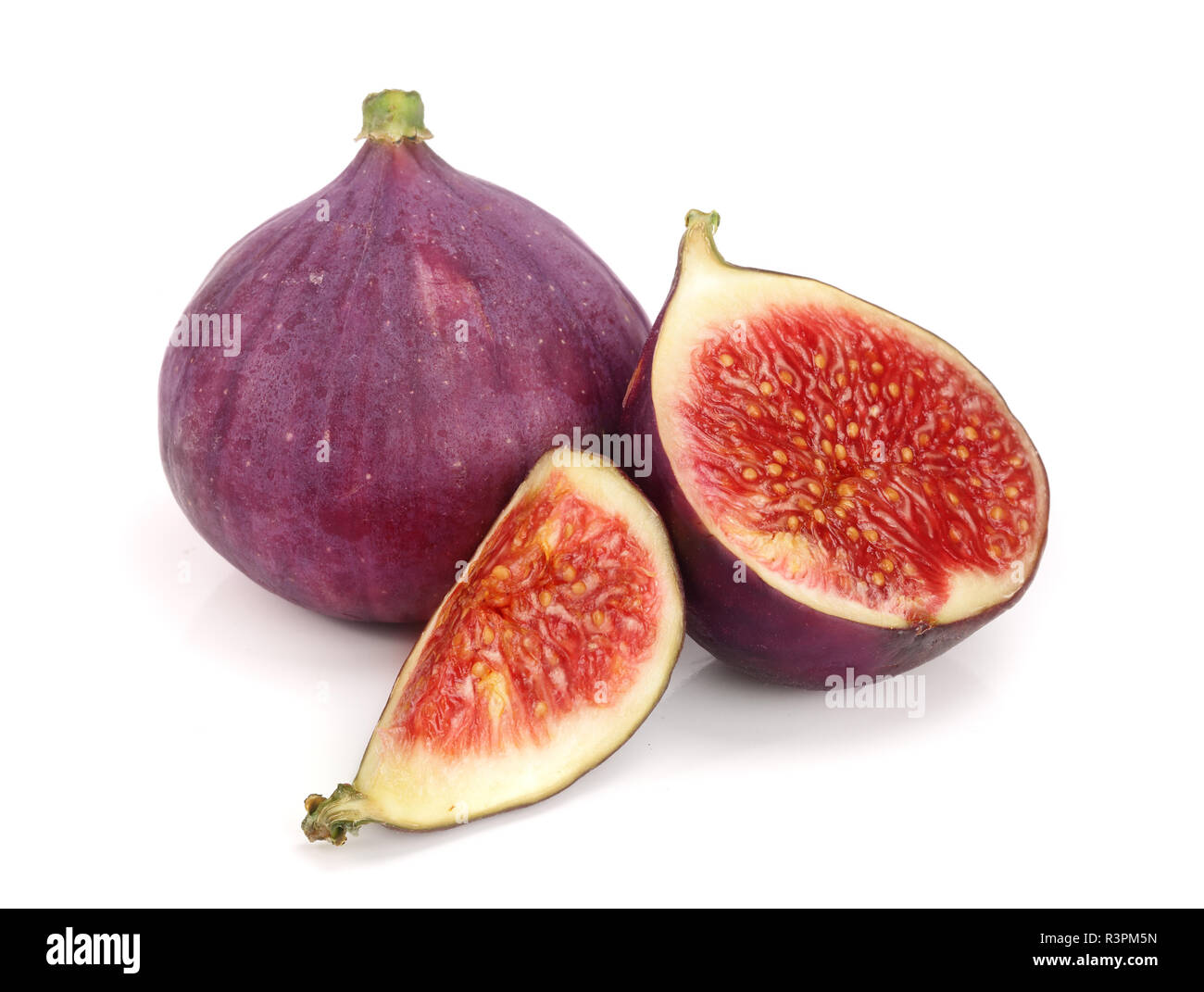 fig fruits with slices isolated on white background Stock Photo - Alamy
