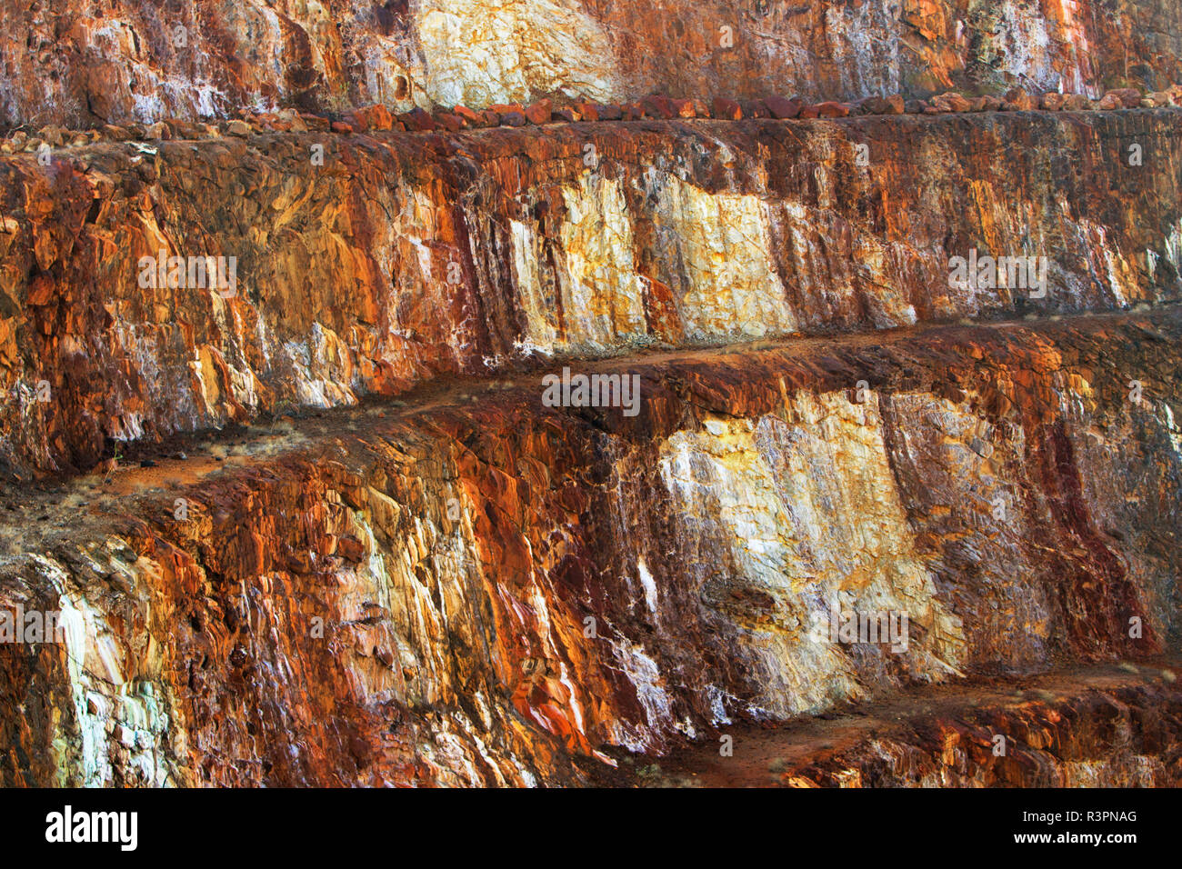 Open cut mine terraces showing exposed rock face background Stock Photo ...