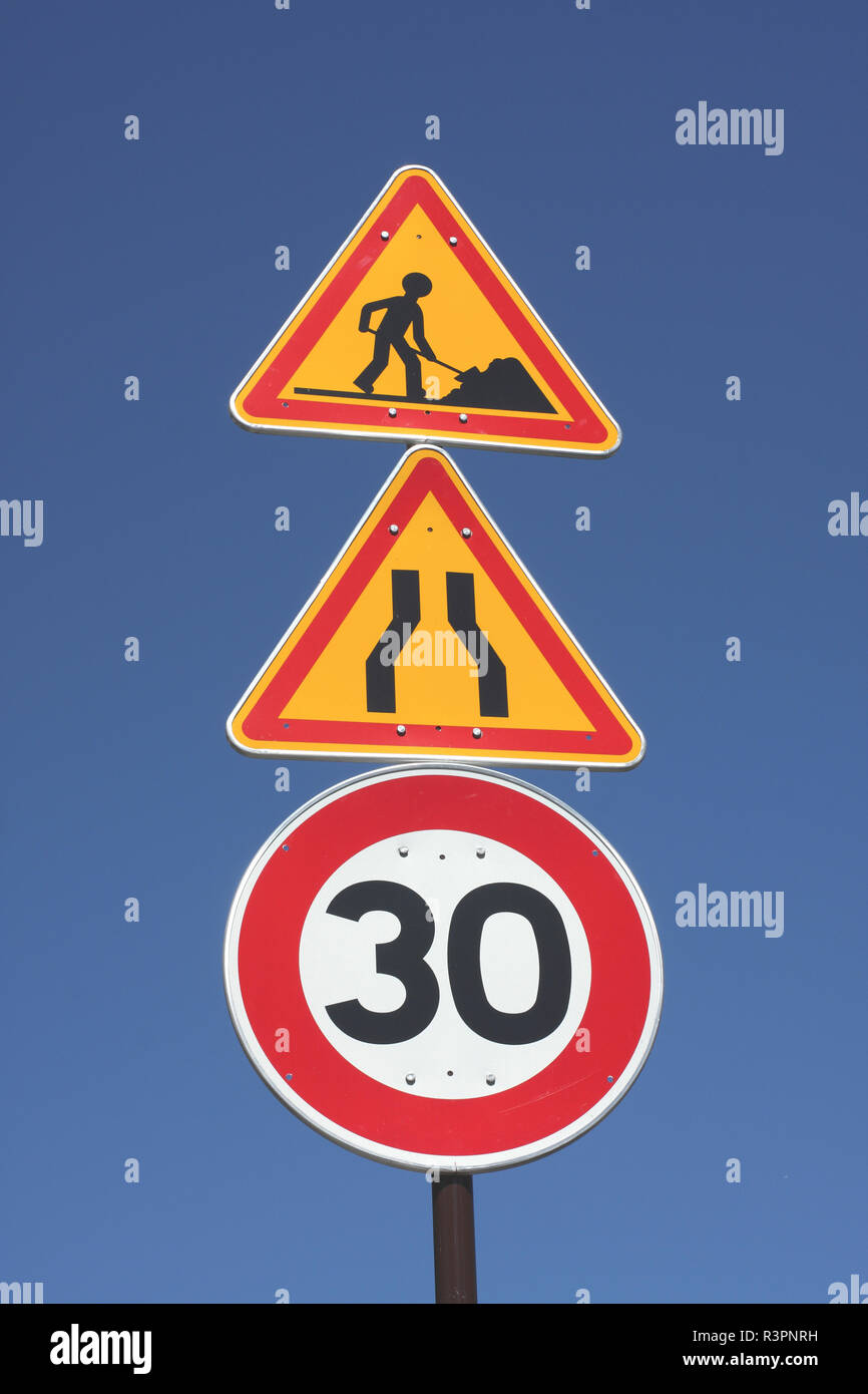 Road sign, road narrows, 30 Kmph, France Stock Photo - Alamy