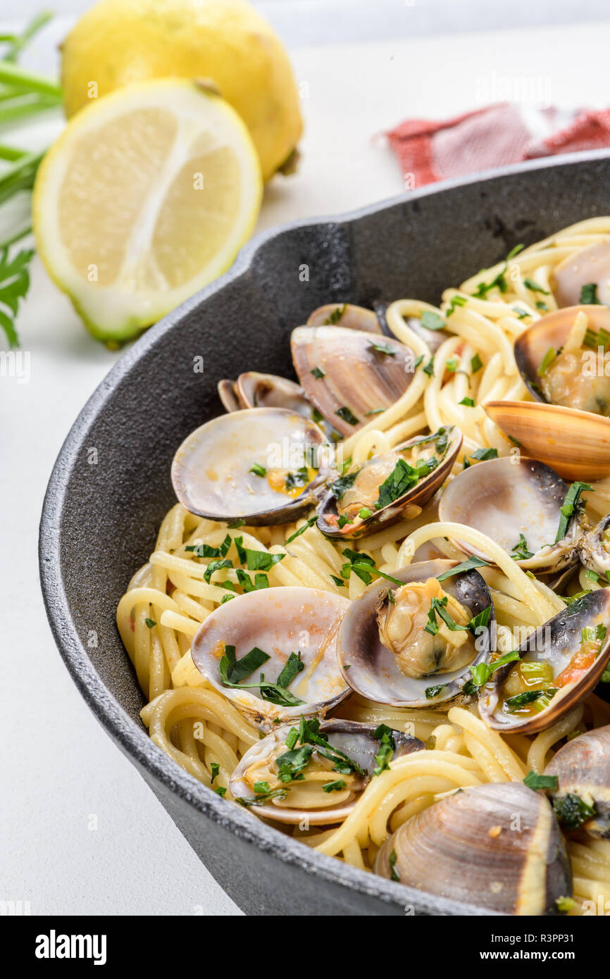 Traditional italian seafood pasta with clams Spaghetti alle Vongole ...