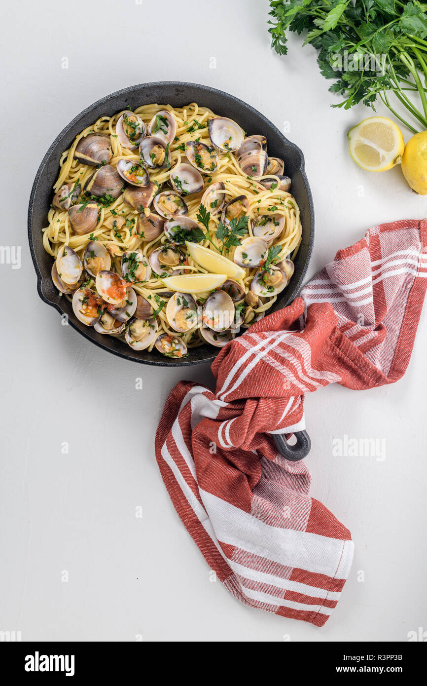 Traditional italian seafood pasta with clams Spaghetti alle Vongole ...