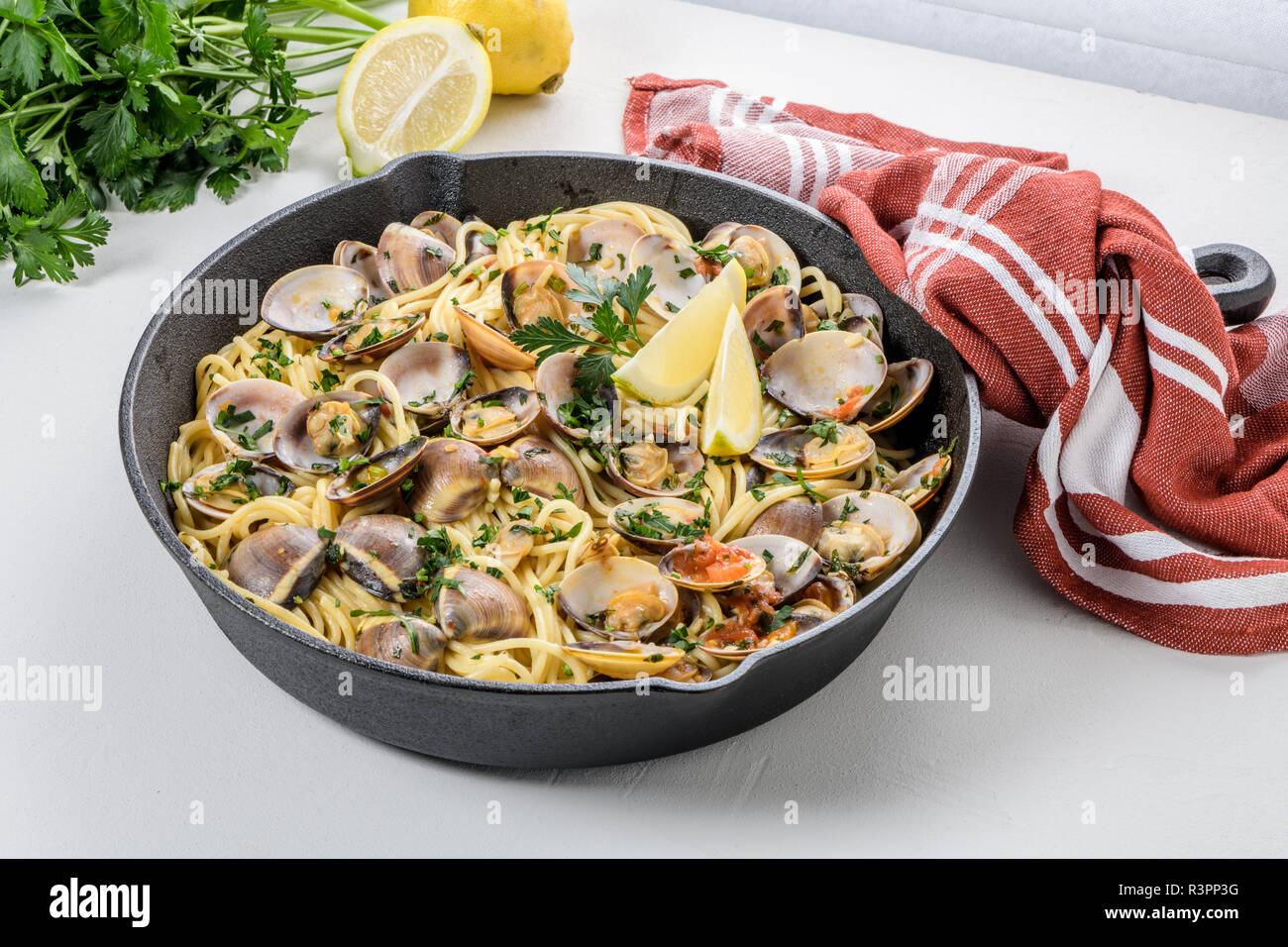 Traditional italian seafood pasta with clams Spaghetti alle Vongole ...