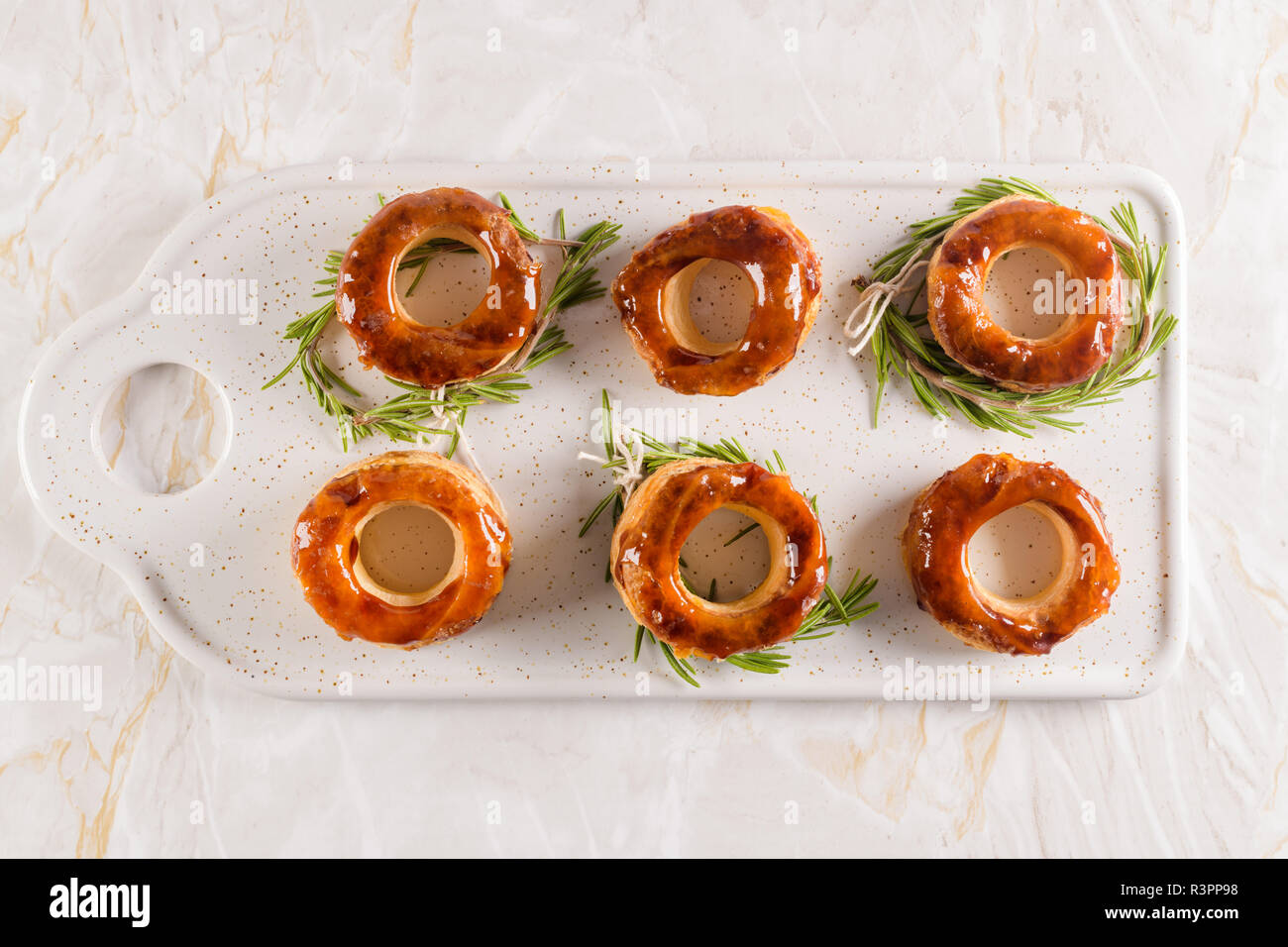 Typical Portuguese pastry Glorias, tender puff pastry topped with ...