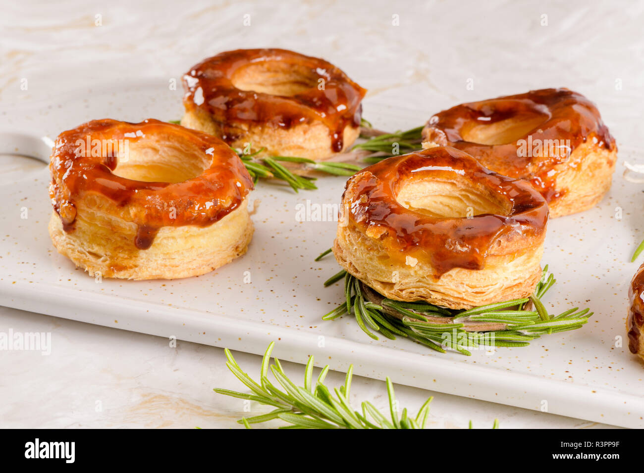 Typical Portuguese pastry Glorias, tender puff pastry topped with ...