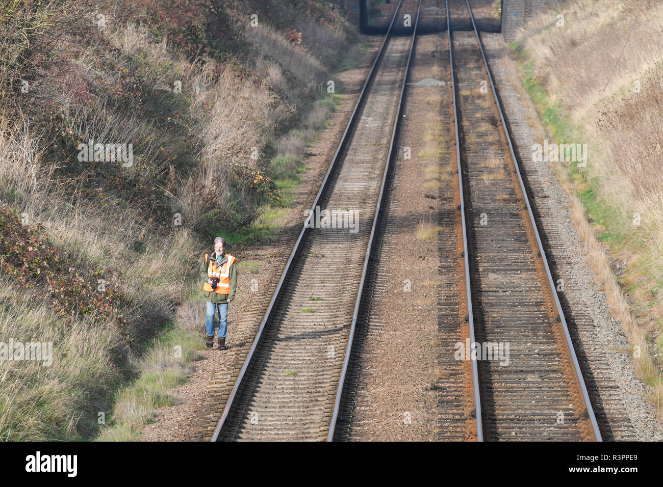 photographer walking next to the great central railway line after ...