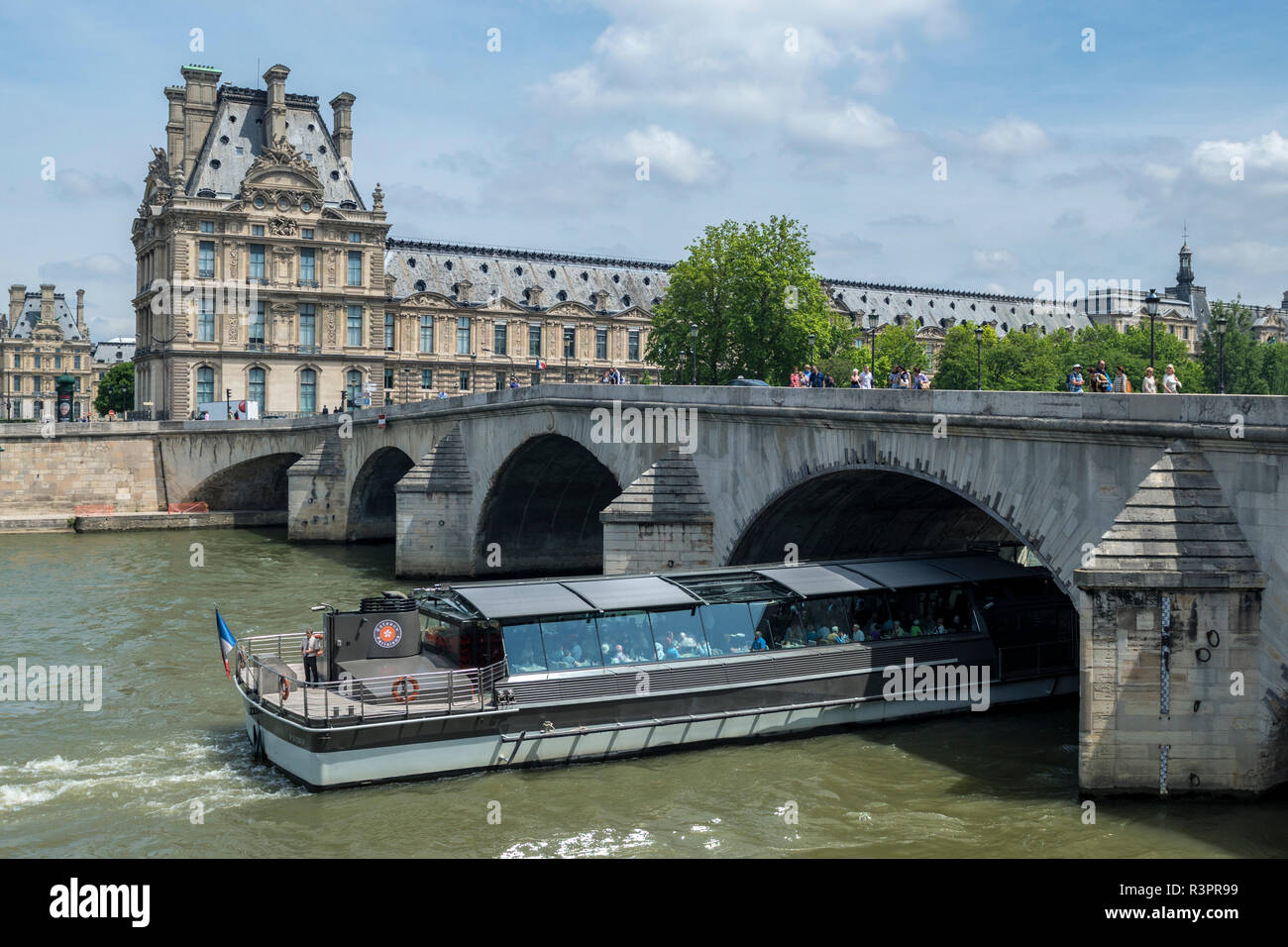 Sightseeing boat along Seine River, Louvre, Paris, France Stock Photo ...
