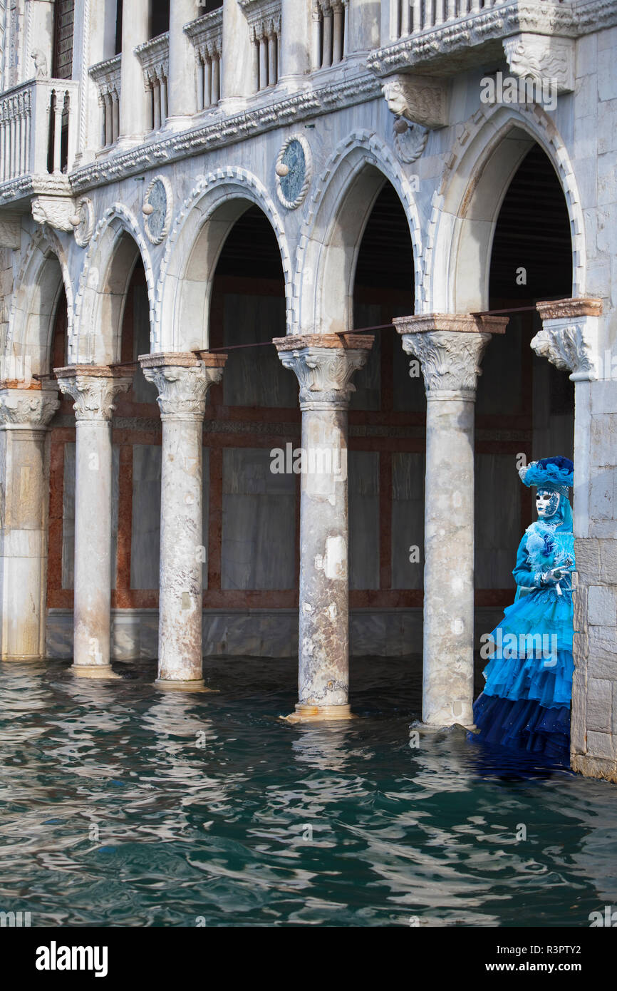 Italy, Venice. Carnival costume and simulated flooding in St. Mark's ...