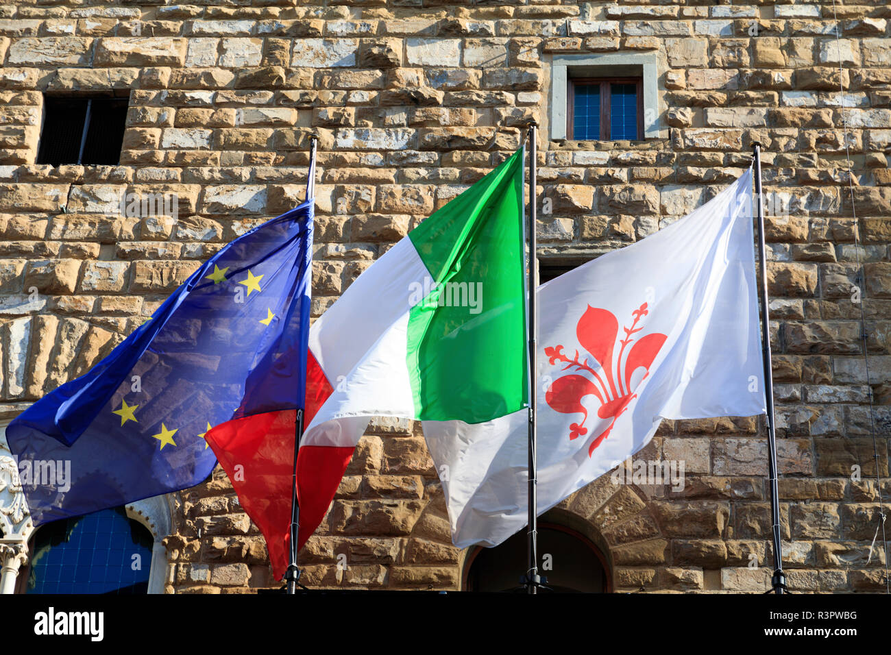 Italy, Florence. Flags of the EU, Italy, and Florence Stock Photo - Alamy
