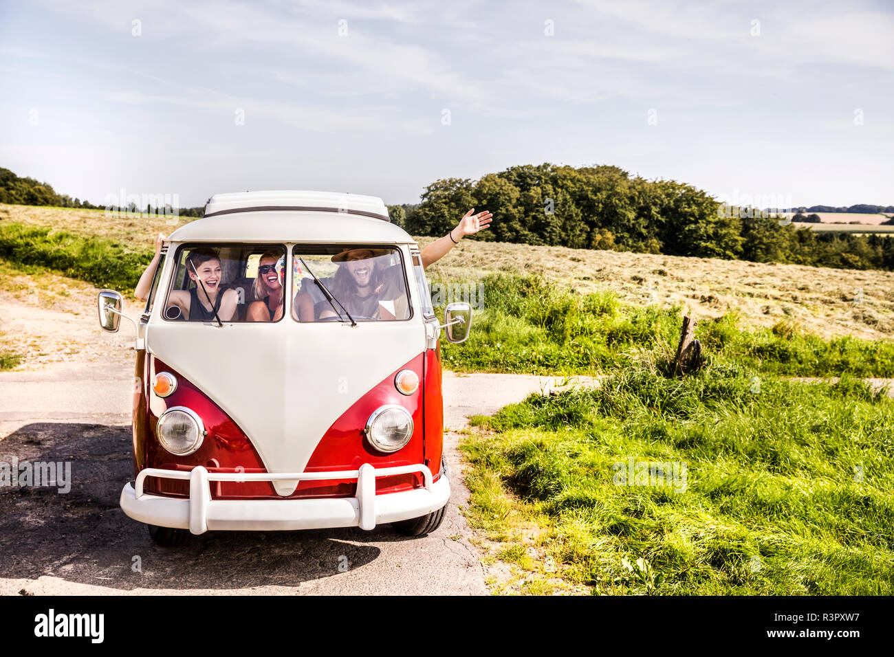 Happy friends driving in hi-res stock photography and images - Alamy