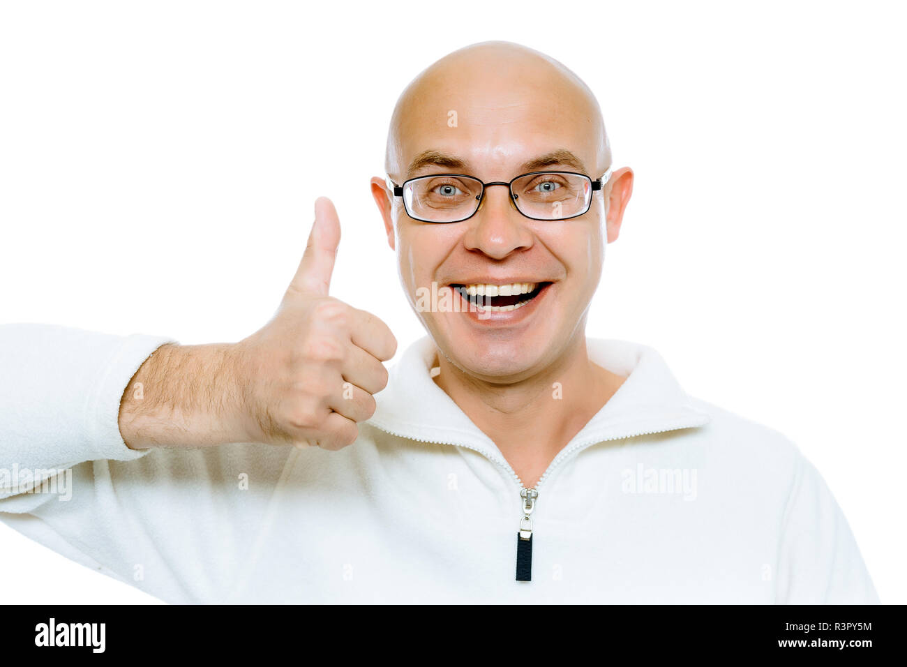 Bald man smiling with thumb up. Isolated on white. Studio Stock Photo ...