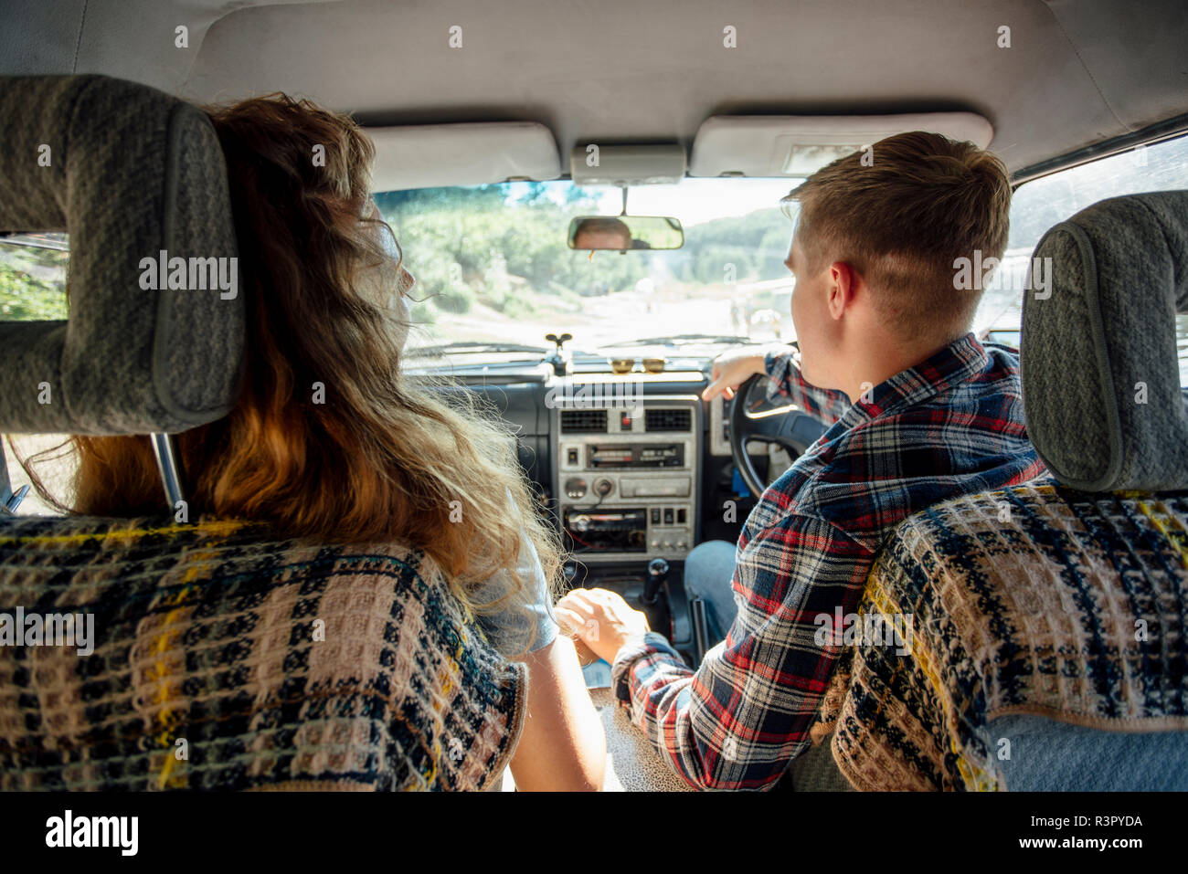 Romantic couple doing road trip Stock Photo - Alamy