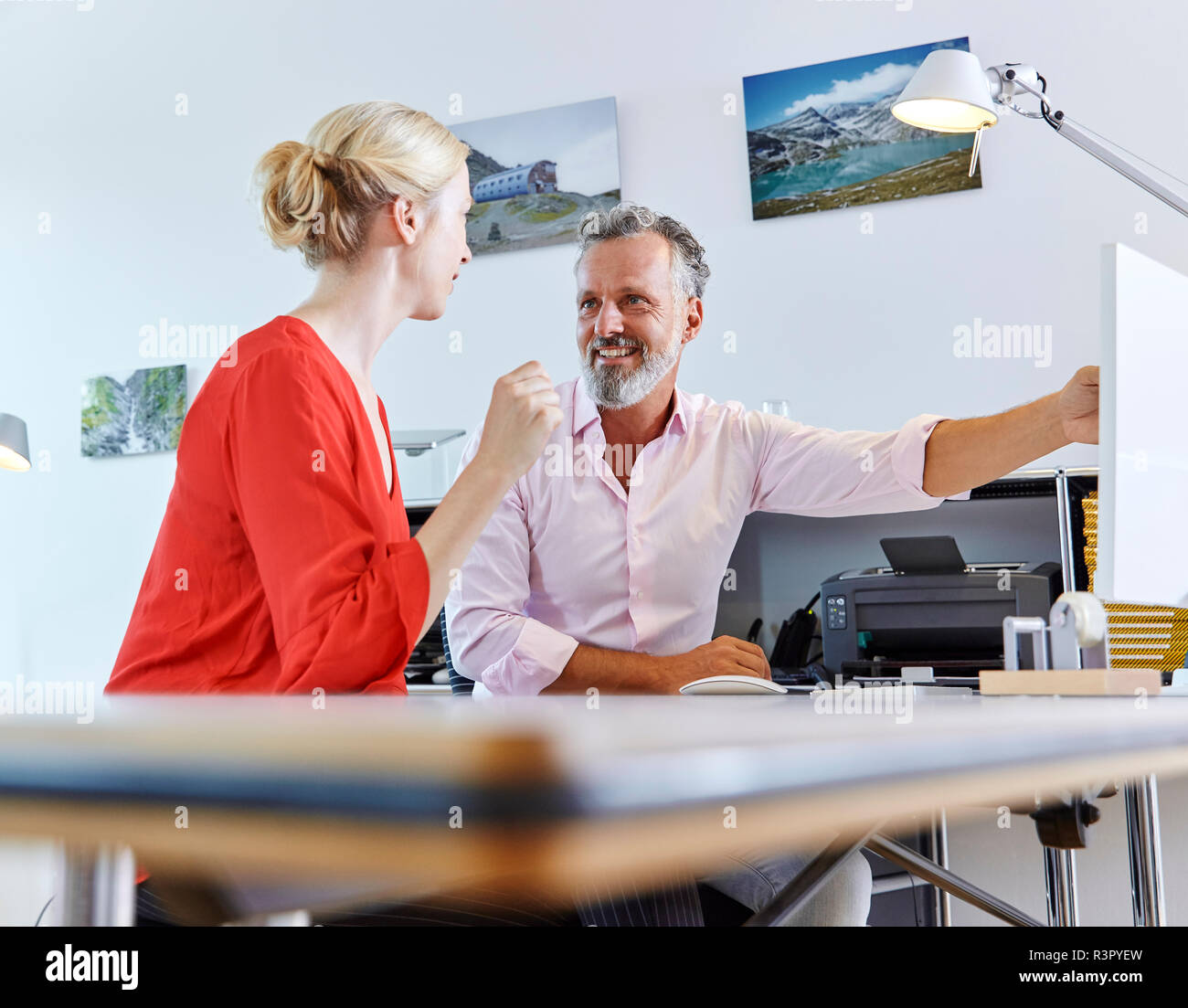 Colleagues talking hi-res stock photography and images - Alamy