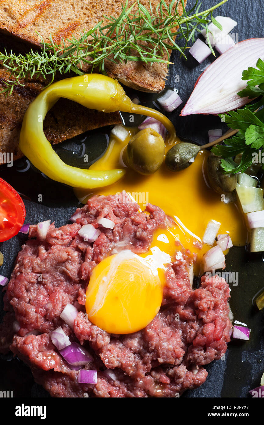steak tartare with egg Stock Photo - Alamy